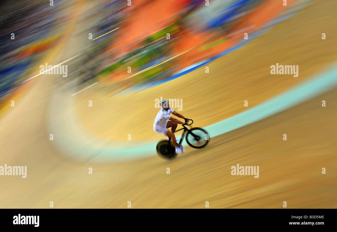 Rider competes in men individual pursuit cycling track race at the 2008 ...