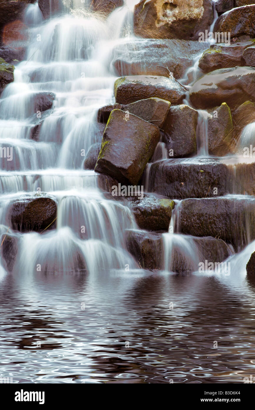 Scenic waterfall with water flowing over rocks Stock Photo - Alamy