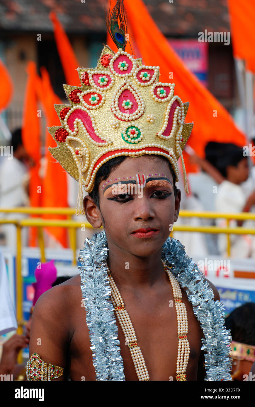 A boy posing as lord krishna in a religious ceremony in Kerala,India ...