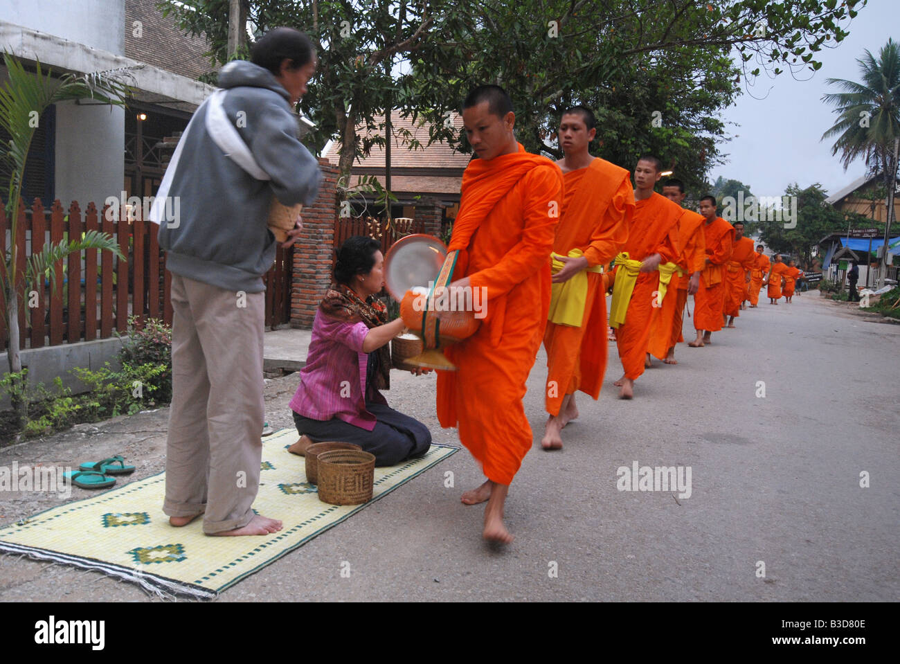 Morning begging alms buddhist monks hi-res stock photography and images ...