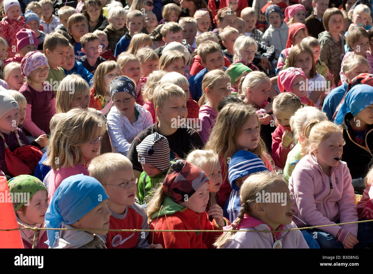 Blonde children watching theatre show in Dalvik, Iceland Stock Photo ...