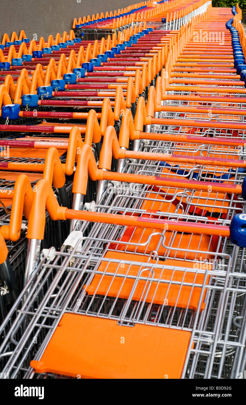 Sainsbury's shopping trollies chained together outside a store Stock ...