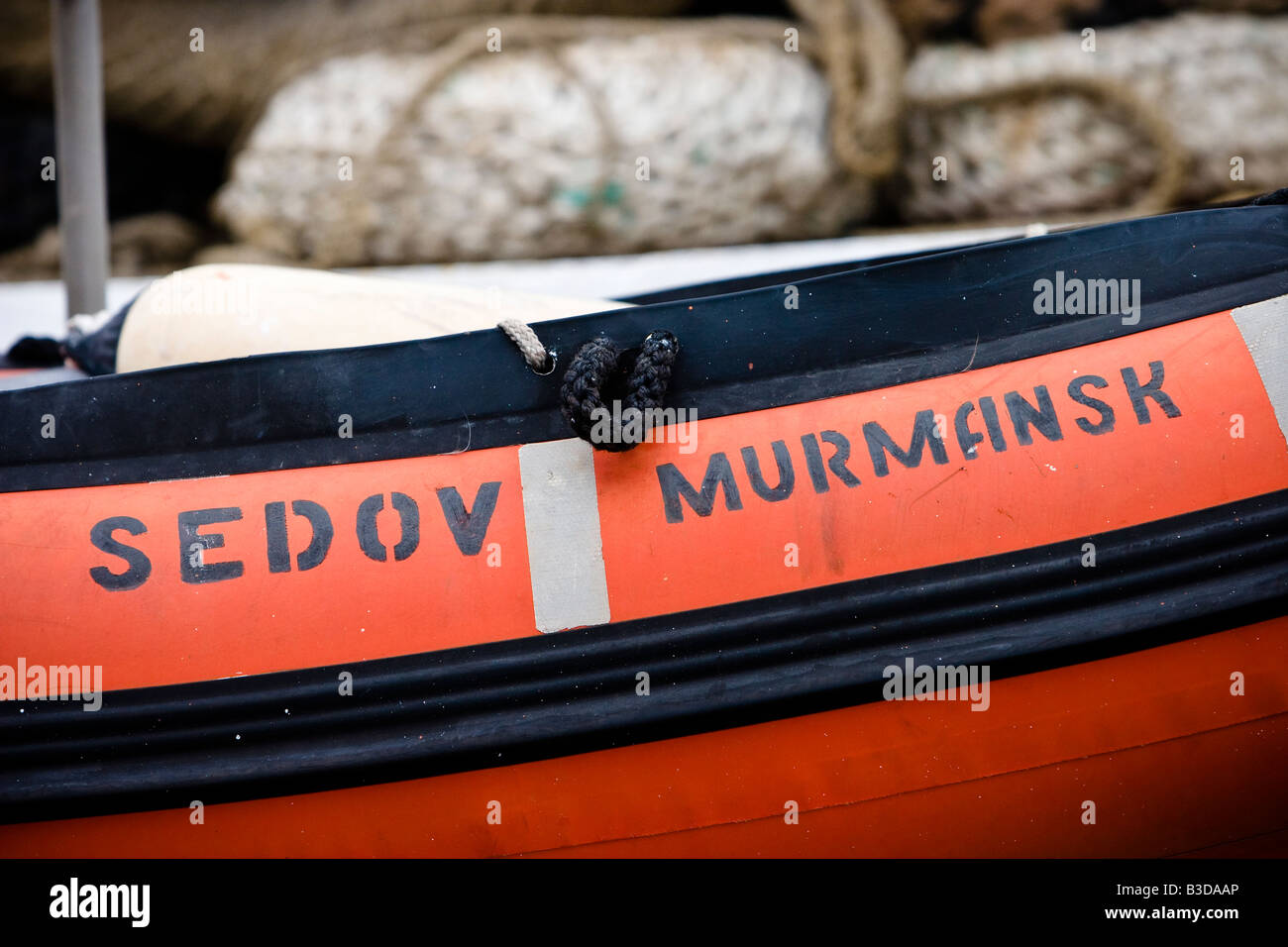 A red inflatable lifeboat at the Sedov, the largest tall ship in the ...