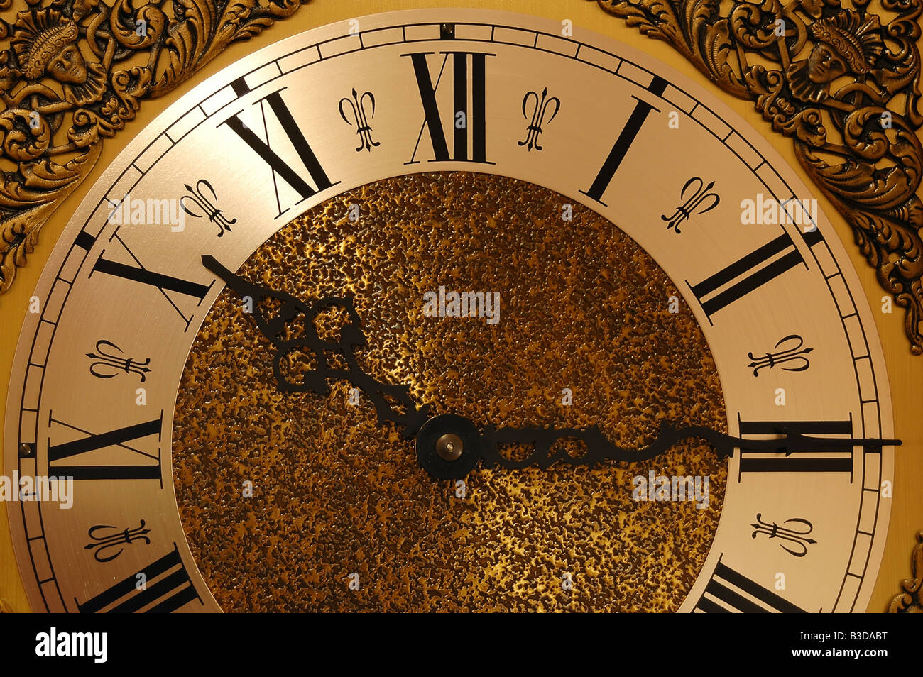Antique clock face with hands in gold tones Stock Photo - Alamy