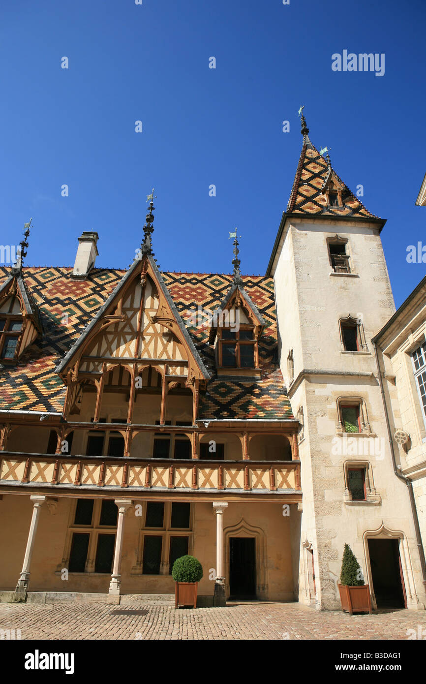 Superb Burgundian roof tiles on the dormers and the wooden gallery of ...