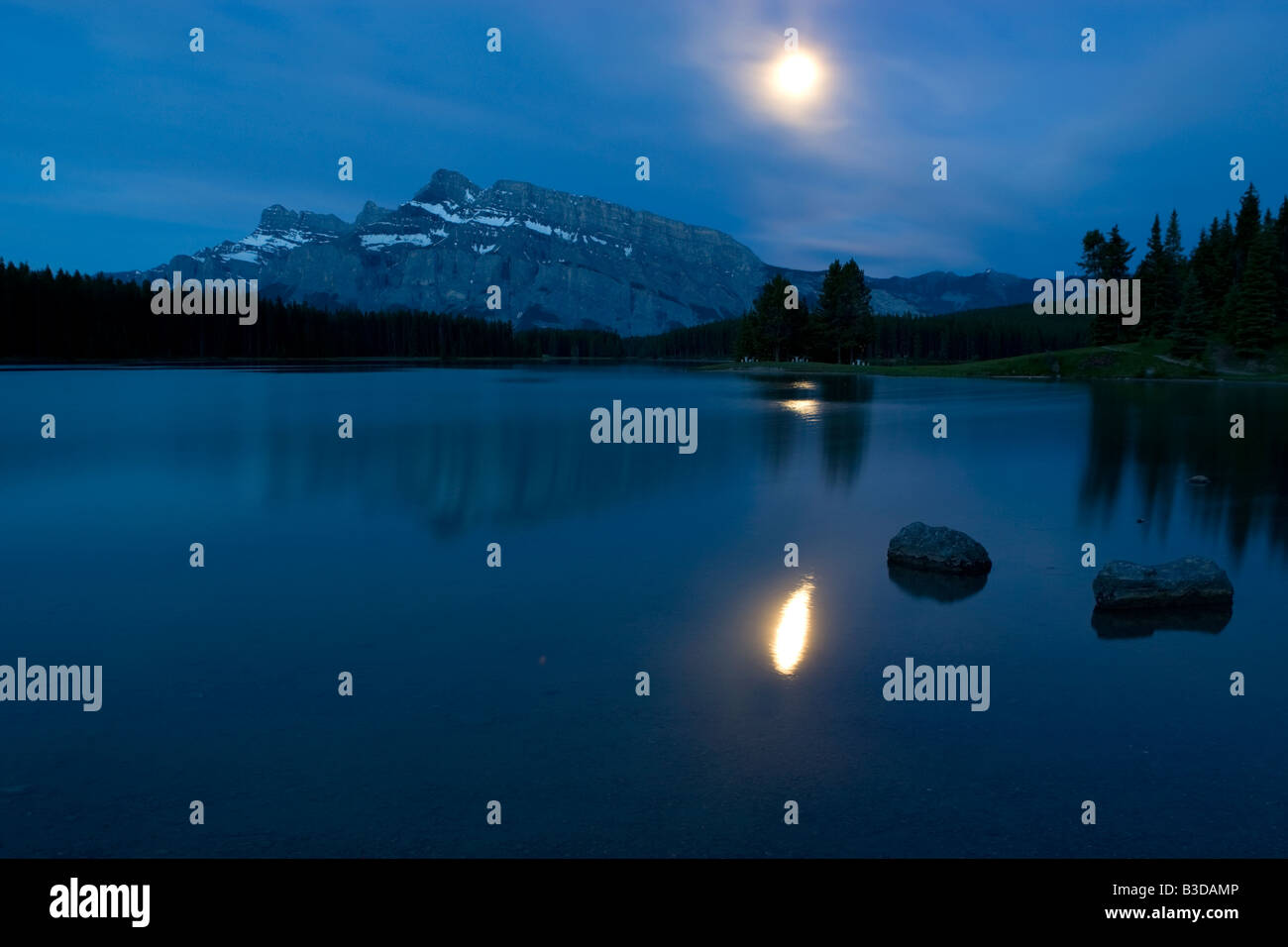 Moonrise over mountain peaks hi-res stock photography and images - Alamy