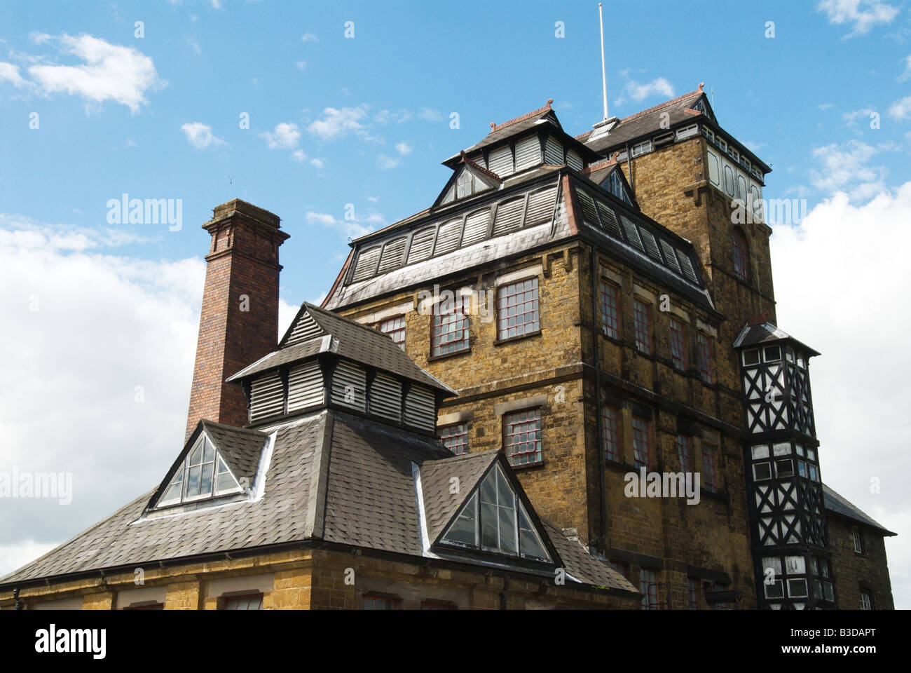 A traditional Victorian tower brewery, the Hook Norton Brewery still ...