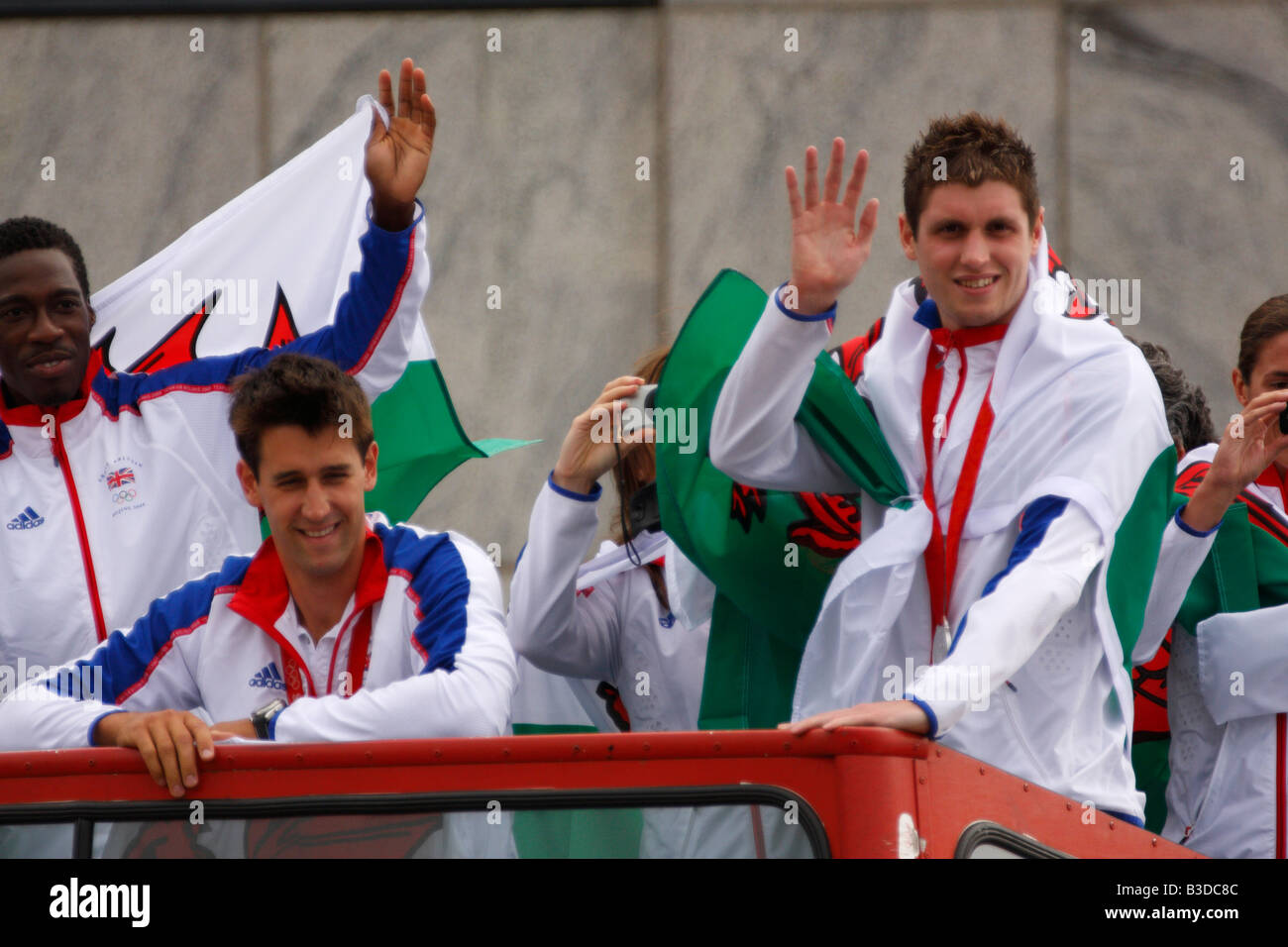 Welsh Olympic Athletes on an open top bus ride in Cardiff Bay Stock ...
