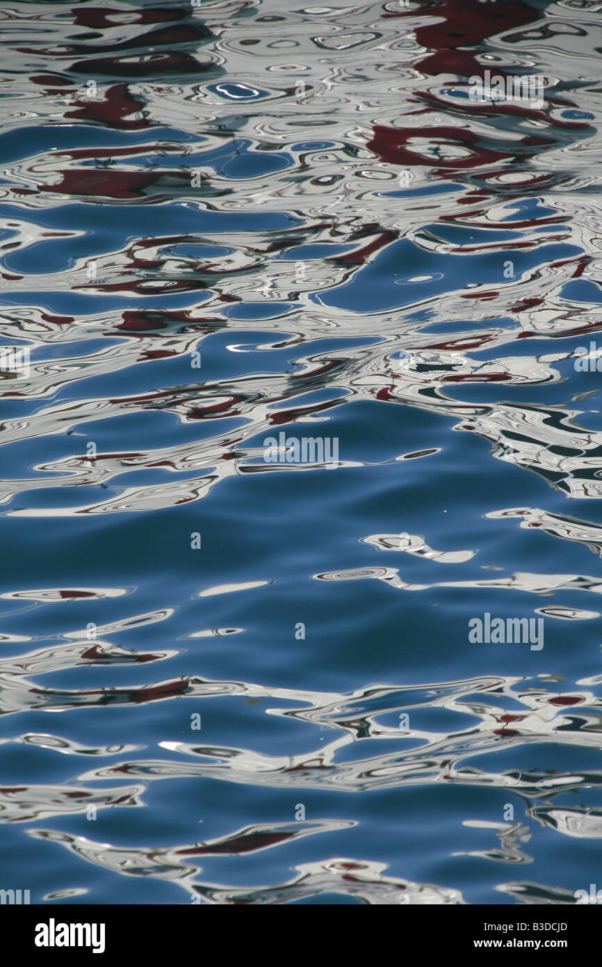 sun light reflection waves on lake water surface Stock Photo - Alamy