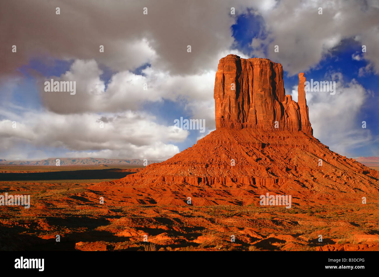 Butte at Sunset in Monument Valley Utah With Cloudy Sky Stock Photo - Alamy
