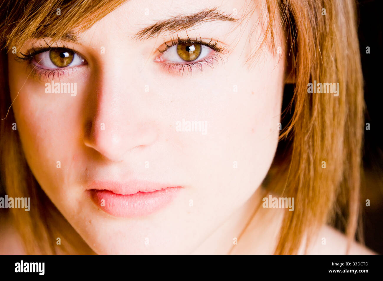 Young woman close portrait high key Stock Photo - Alamy