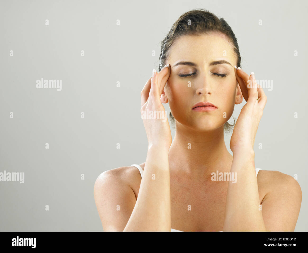 Woman with Hands on Head Stock Photo - Alamy