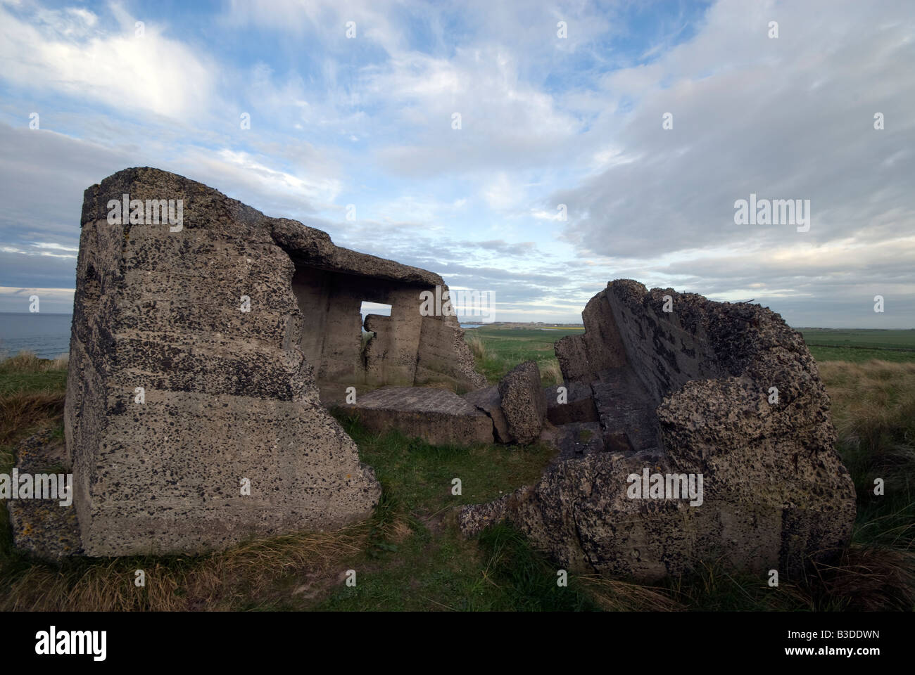 Ruined broken concrete second world war defence bunker on the ...