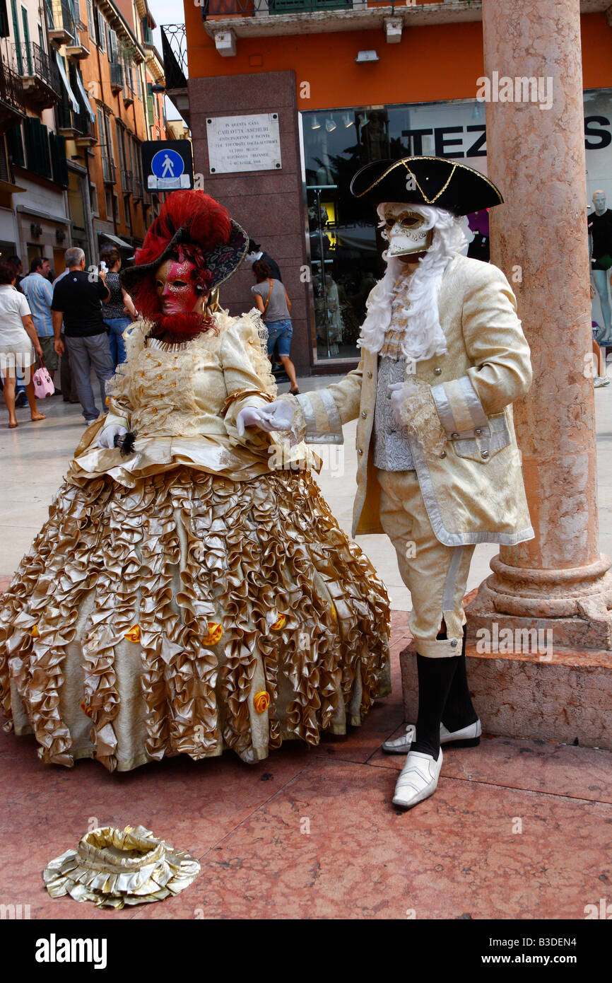 Theatrical - classic opera costume dressed aristocrat couple on street ...