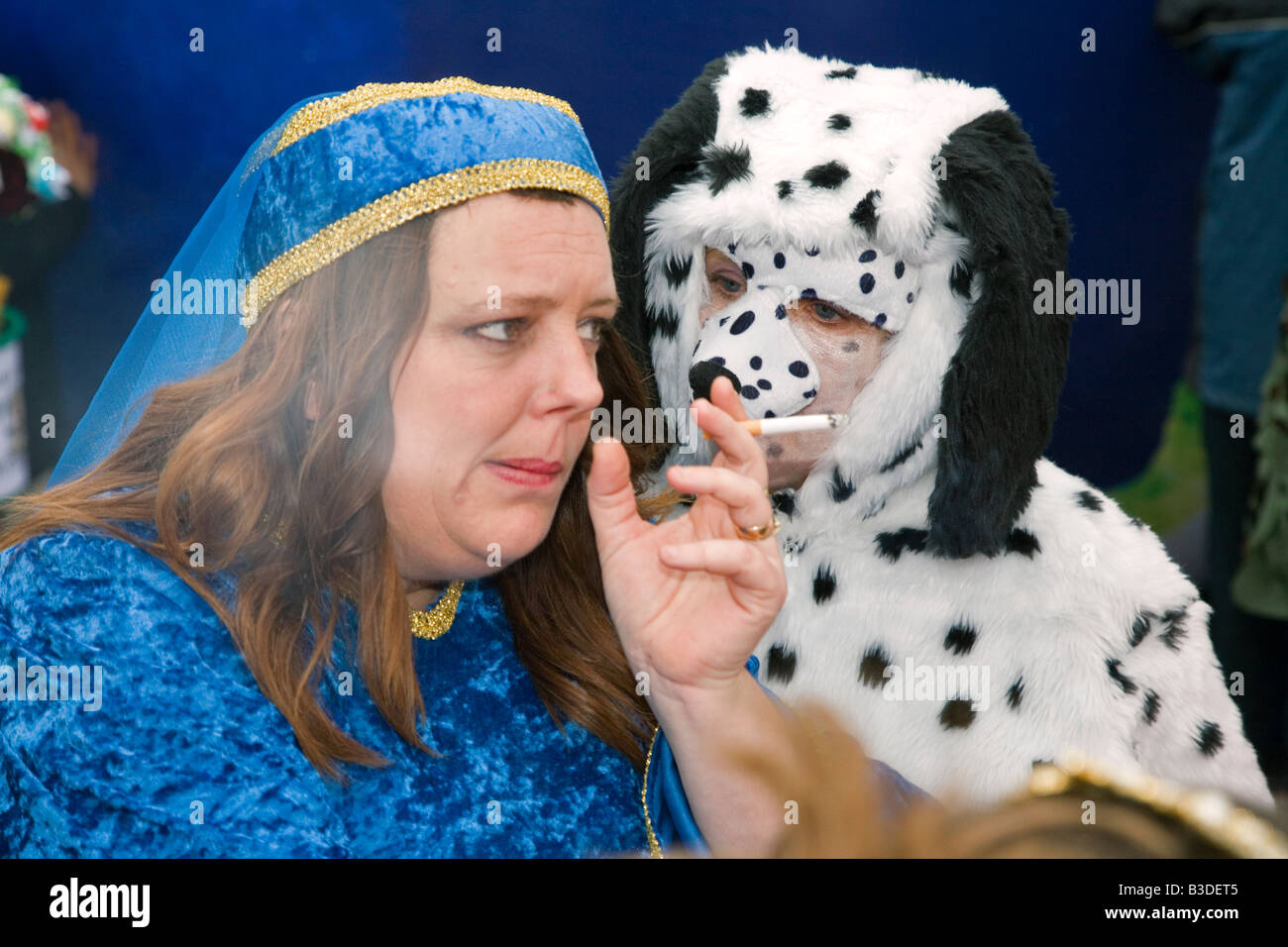 two people in fancy dress at the annual New Years day Show in London ...