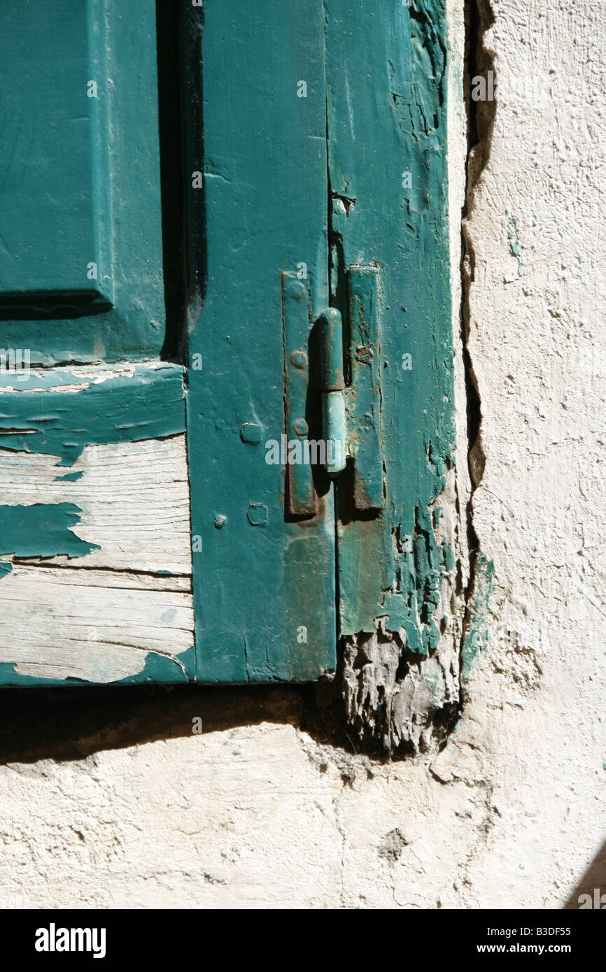 old damaged green wooden window shutters Stock Photo - Alamy