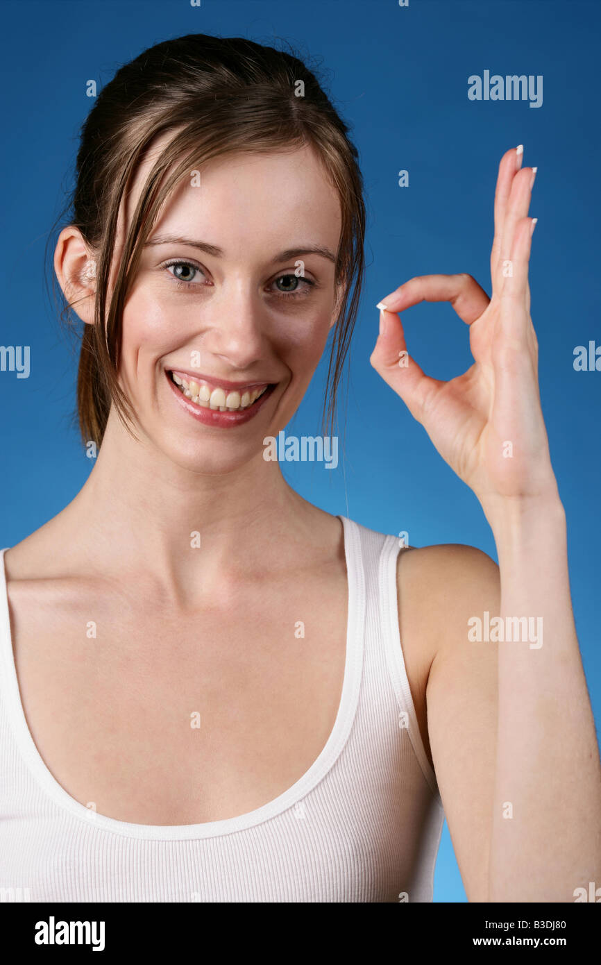female model giving the ok Stock Photo - Alamy