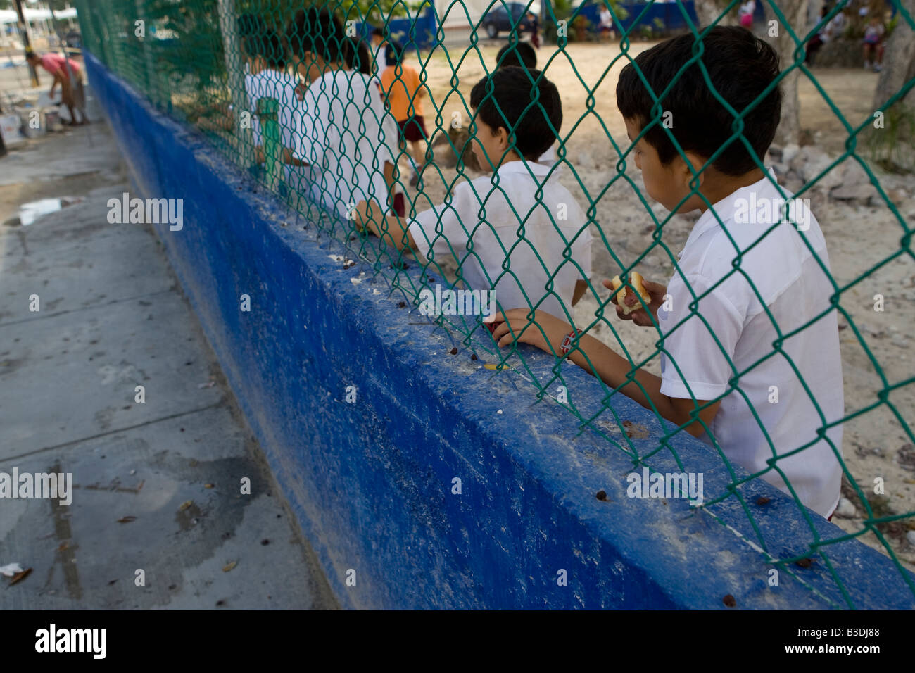 Kids playing in Cancun Mexico Stock Photo - Alamy