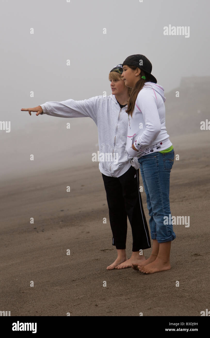 Sibblings at the beach Stock Photo - Alamy