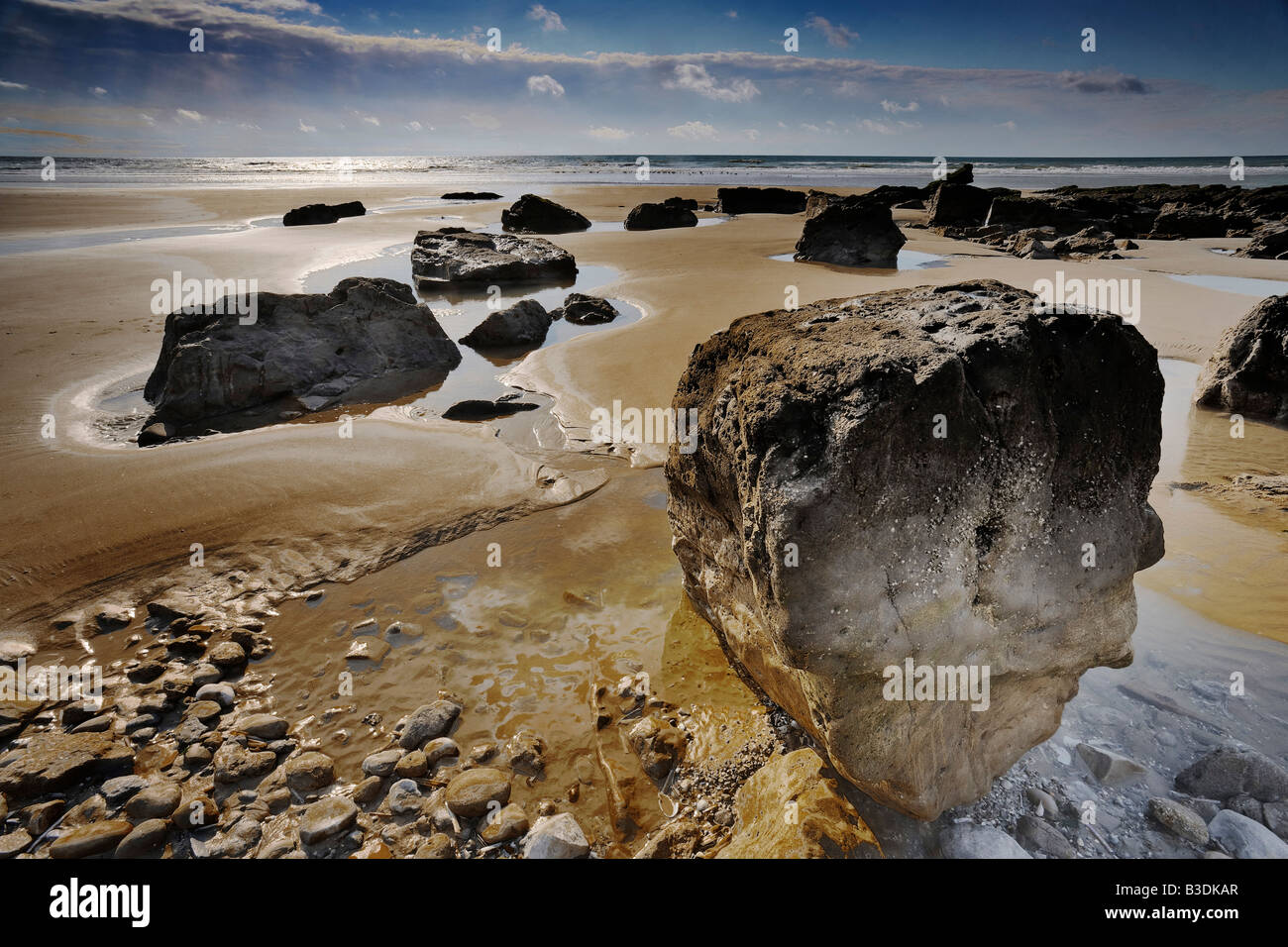 Rocks on a Beach in North France Stock Photo - Alamy