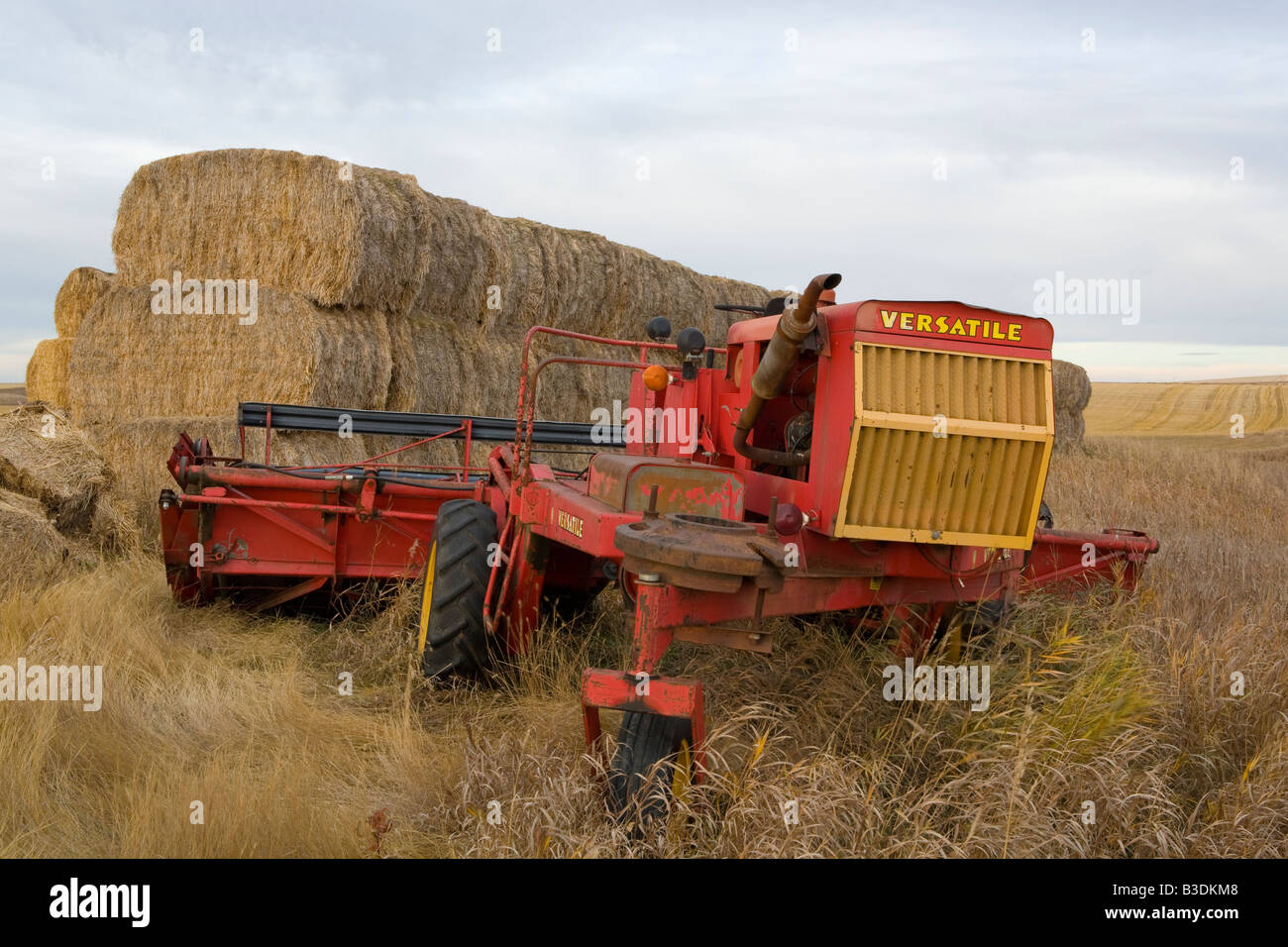 An old farm tractor on the Canadian Prairie Stock Photo - Alamy