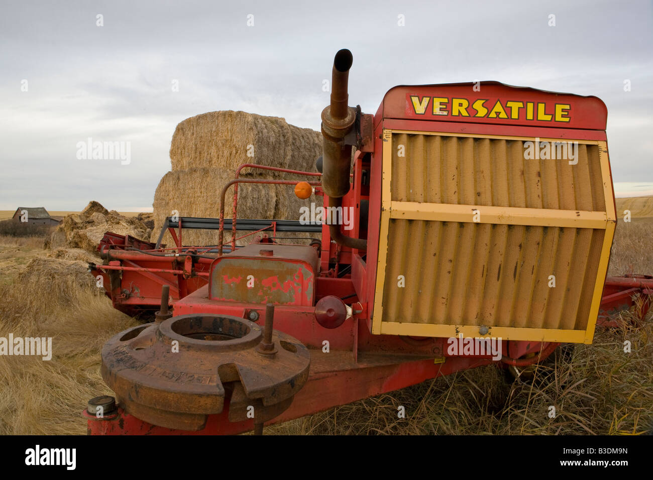 An old farm tractor on the Canadian Prairie Stock Photo - Alamy