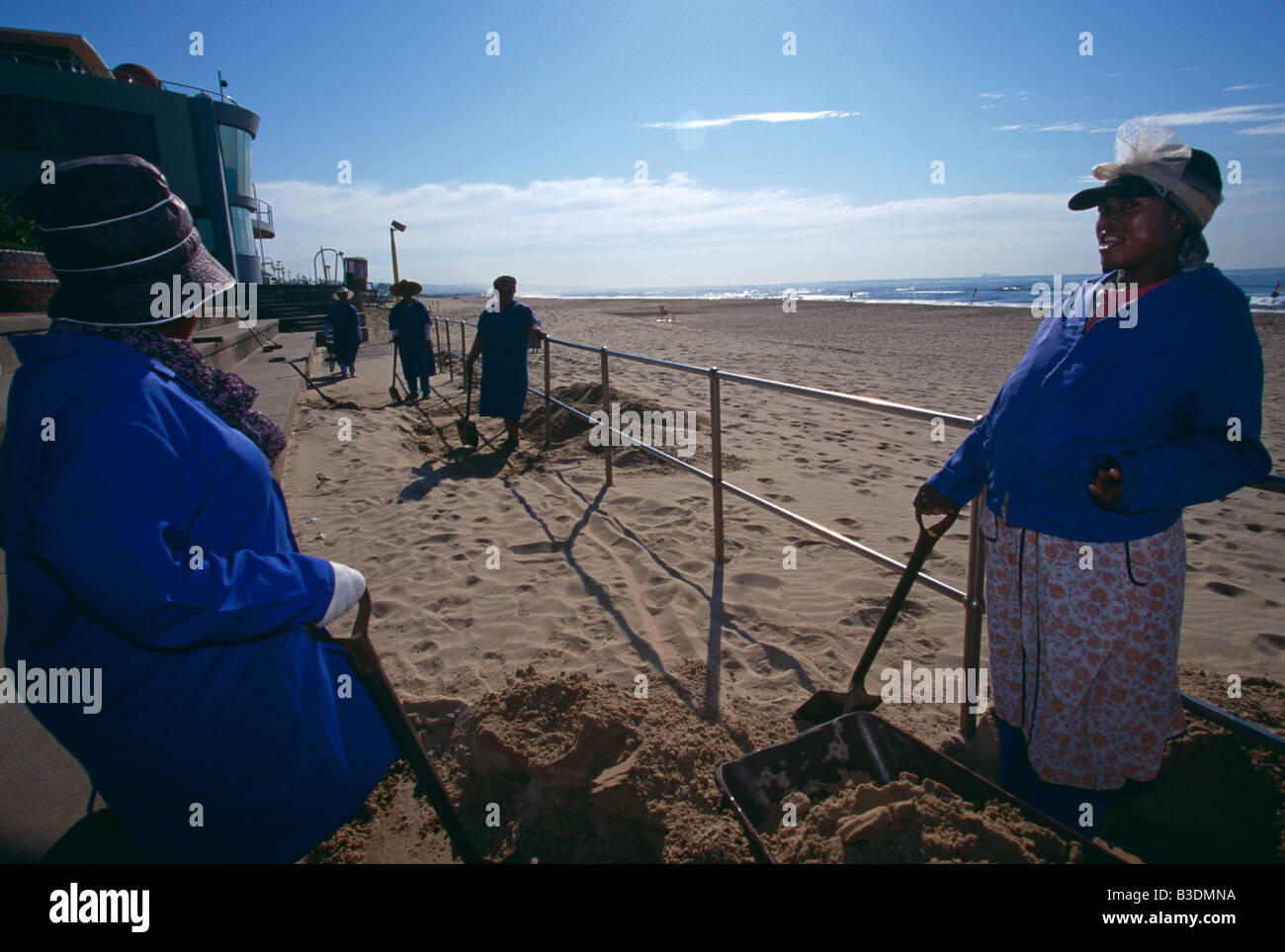 Workers at a beach in Durban, South Africa Stock Photo - Alamy