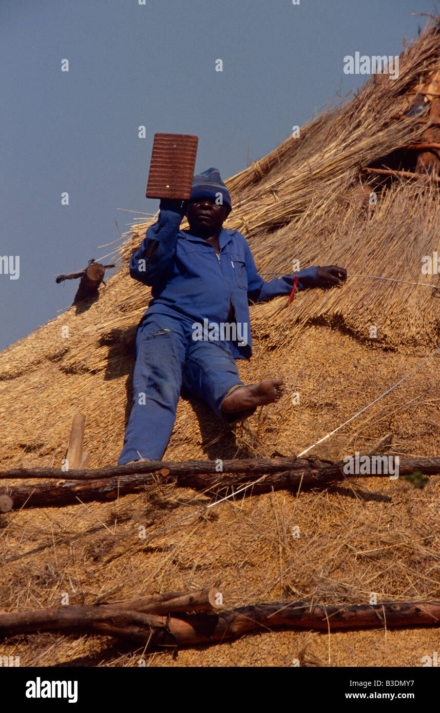 Worker at the construction of a new tourist resort in South Africa ...