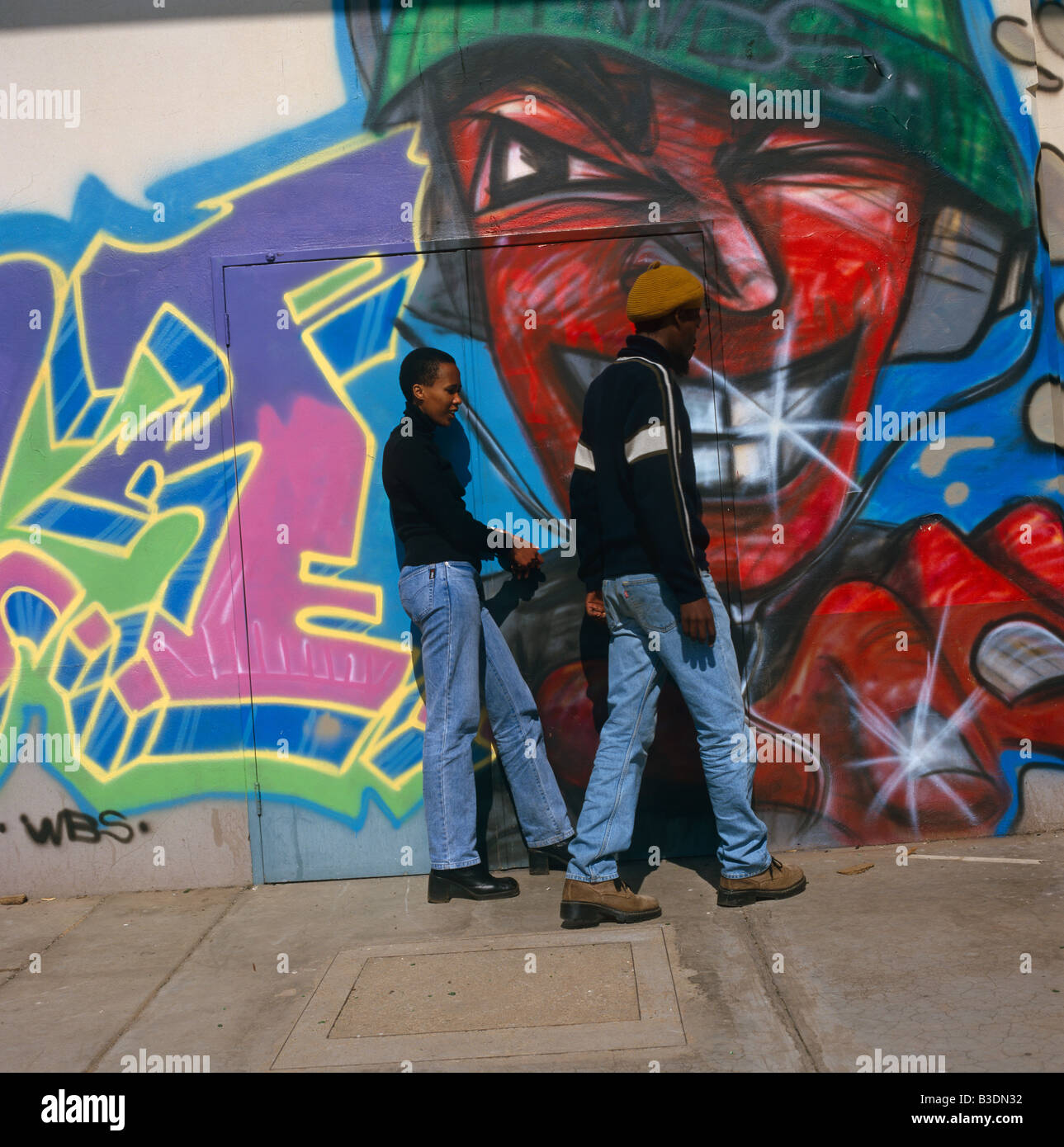 African man painting door hi-res stock photography and images - Alamy