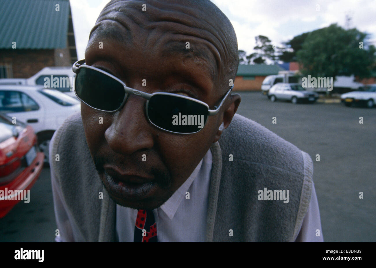 Shaven head african hi-res stock photography and images - Alamy