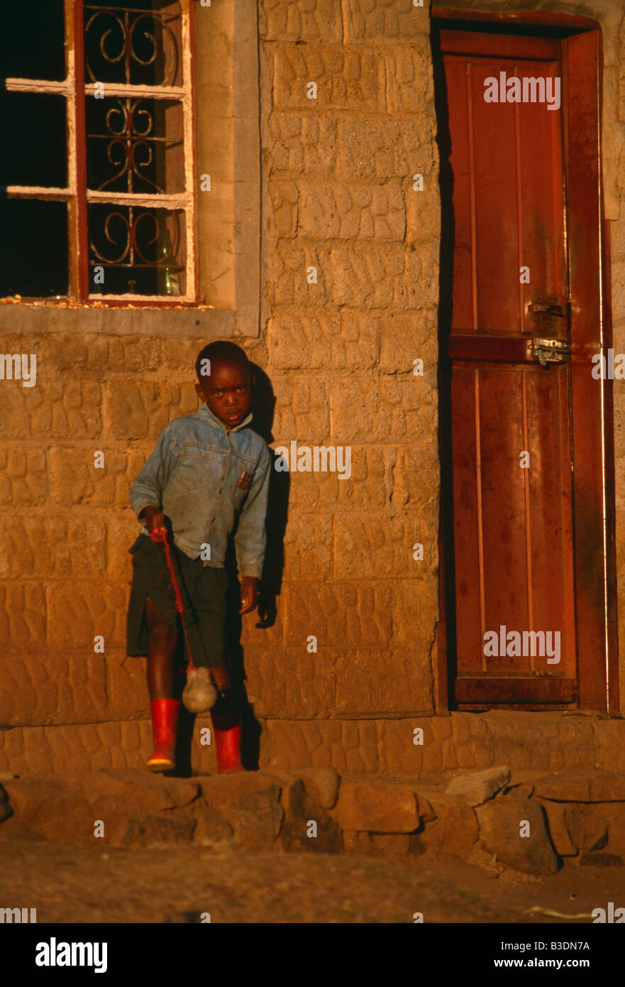 Boy outside his home in South Africa Stock Photo - Alamy