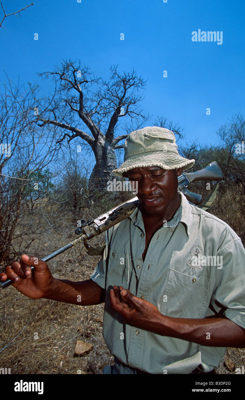 Man carrying gun over shoulder High Resolution Stock Photography and ...
