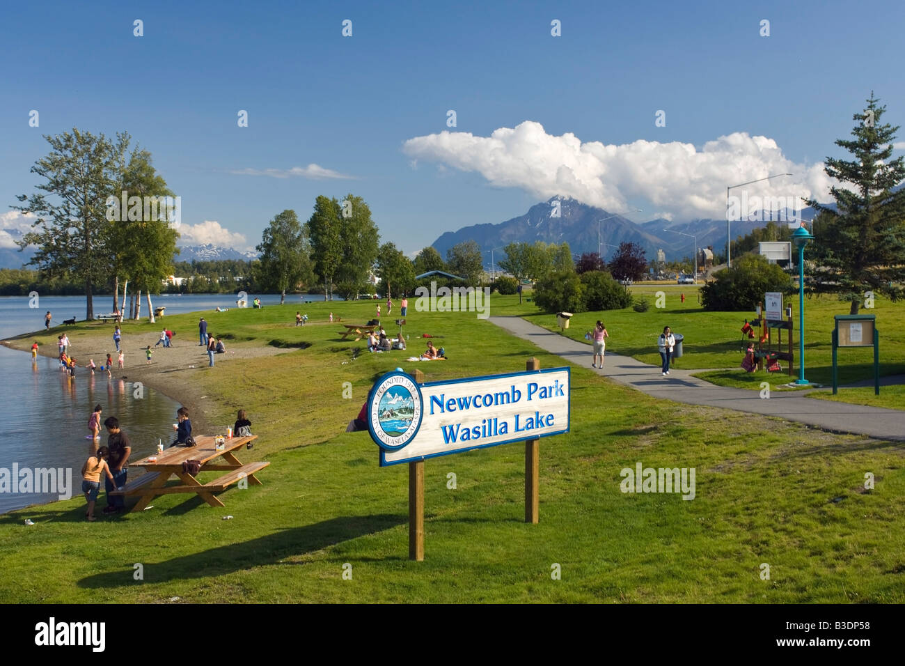 Visitors enjoy a sunny August afternoon play at the beach at Wasilla ...