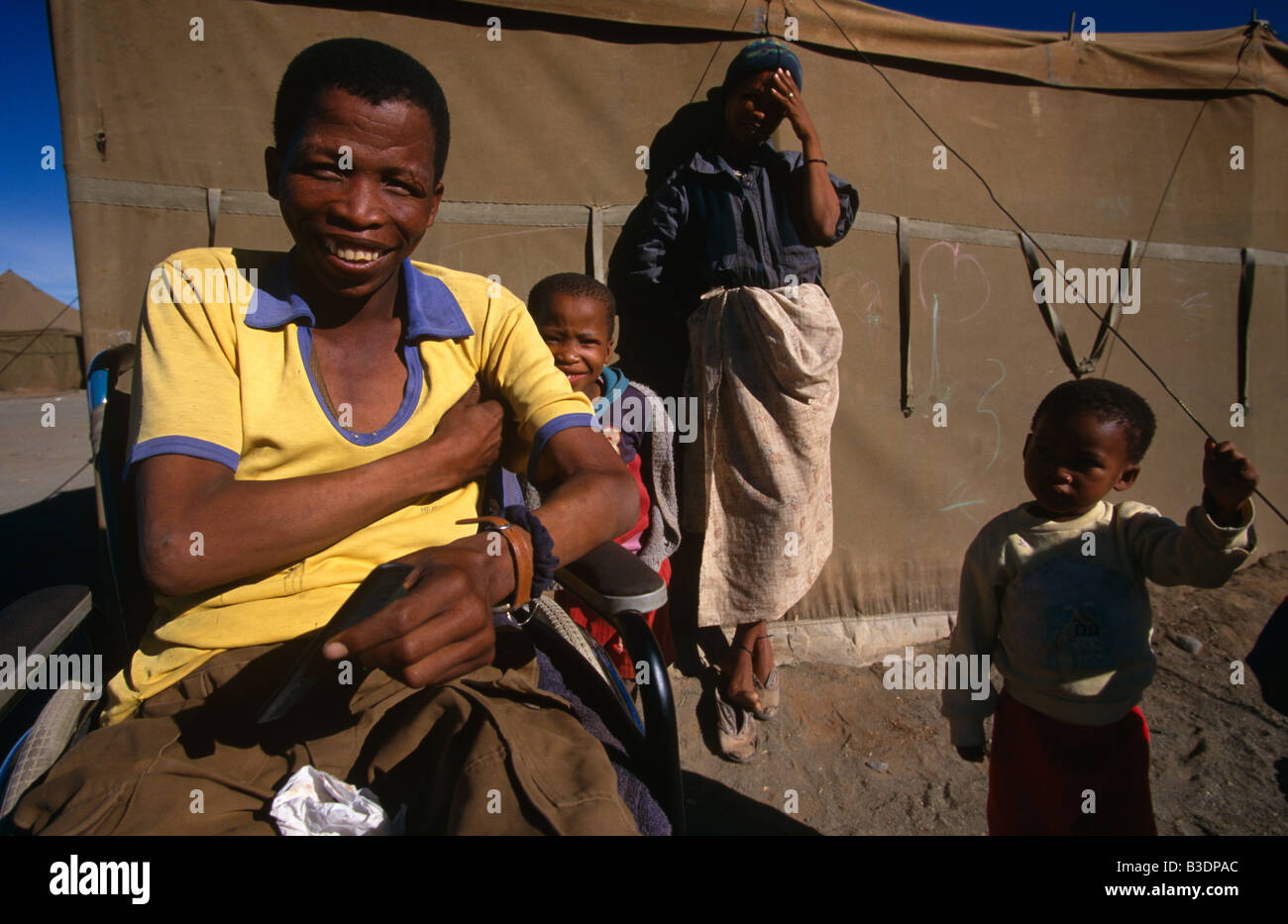 African wheelchair poverty hi-res stock photography and images - Alamy