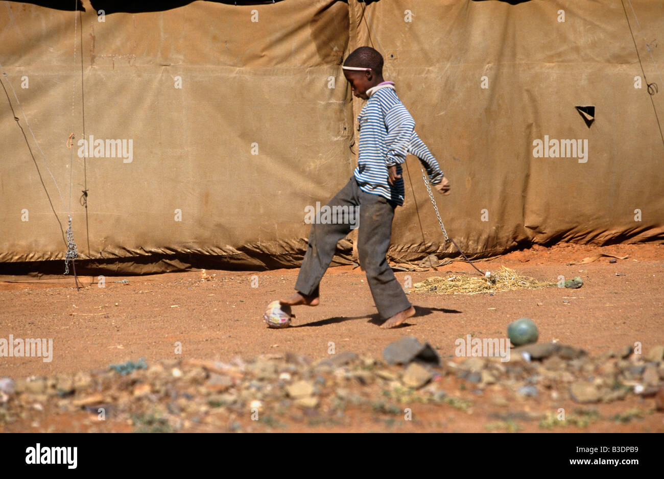 Boy playing ball, Schmidtsdrift camp, Northern Cape, South Africa Stock ...