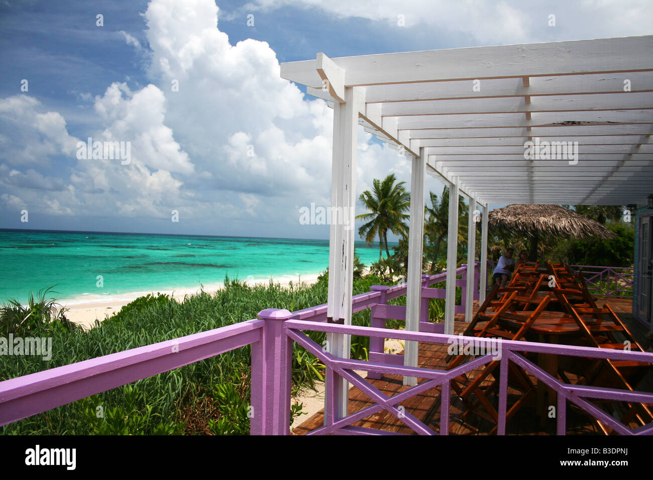 Deck and trellis with a view of a secluded beach in Eleuthera Bahamas ...