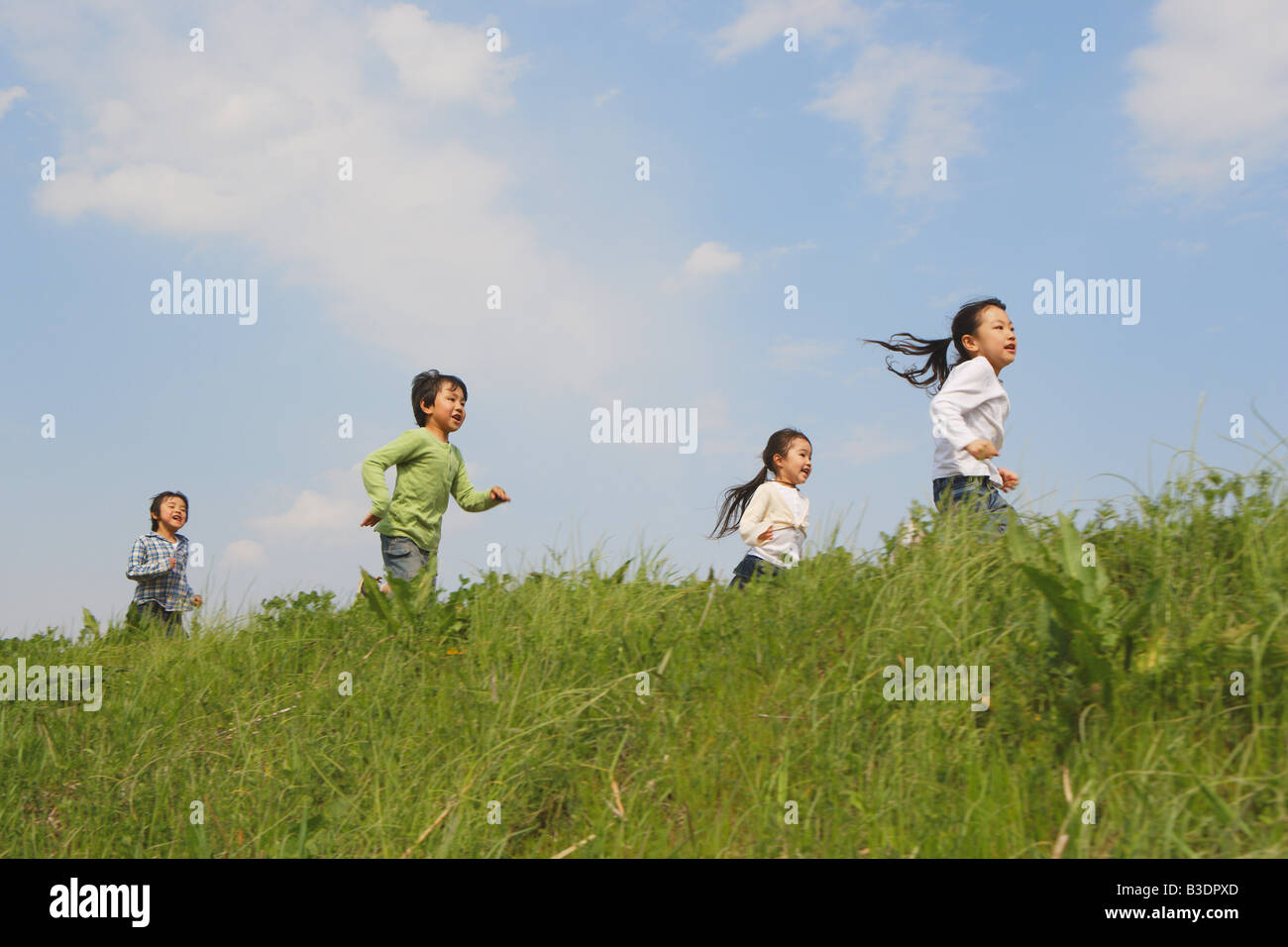 Children playing in urban park hi-res stock photography and images - Alamy
