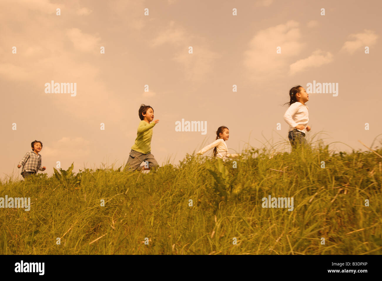 Children playing in urban park hi-res stock photography and images - Alamy