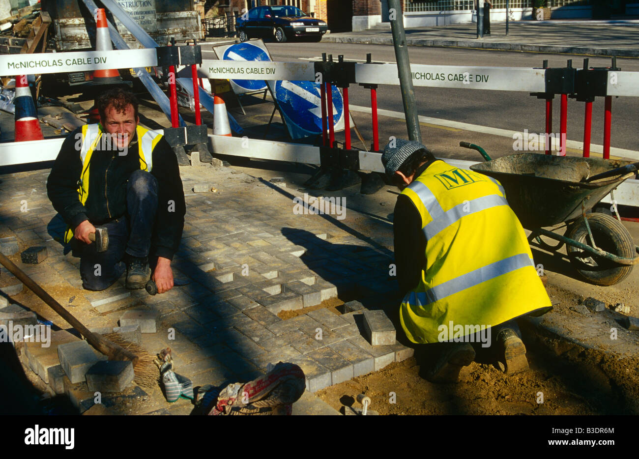Fixing the pavement hi-res stock photography and images - Alamy