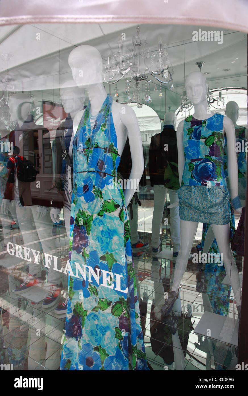fashion dummies in boutique shop window Stock Photo - Alamy