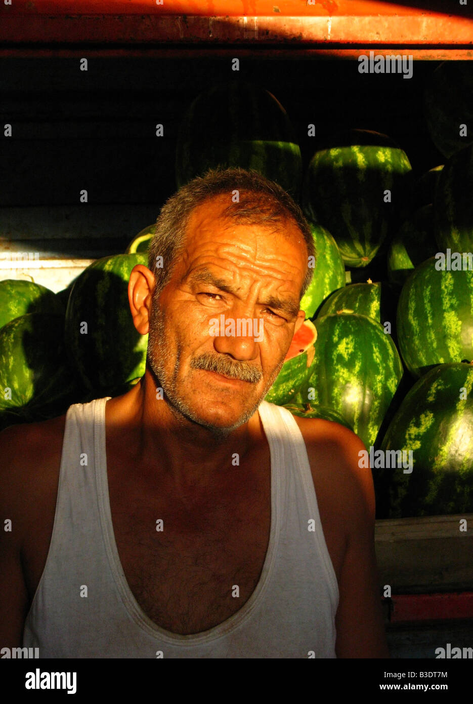 Man with watermelon at street bazaar Alanya Turkey Stock Photo - Alamy