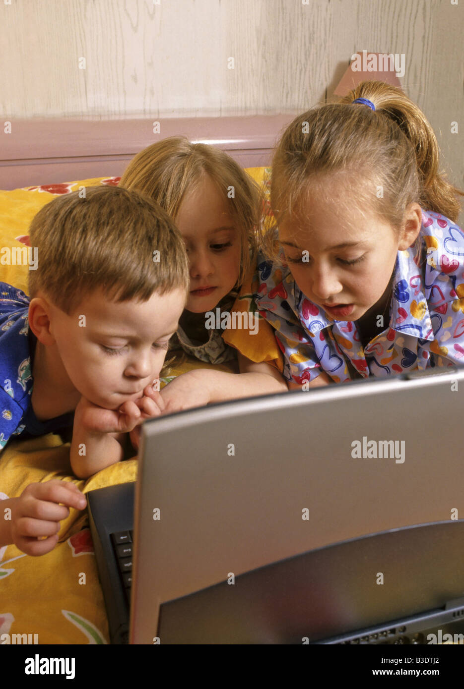 Children with laptop Stock Photo - Alamy