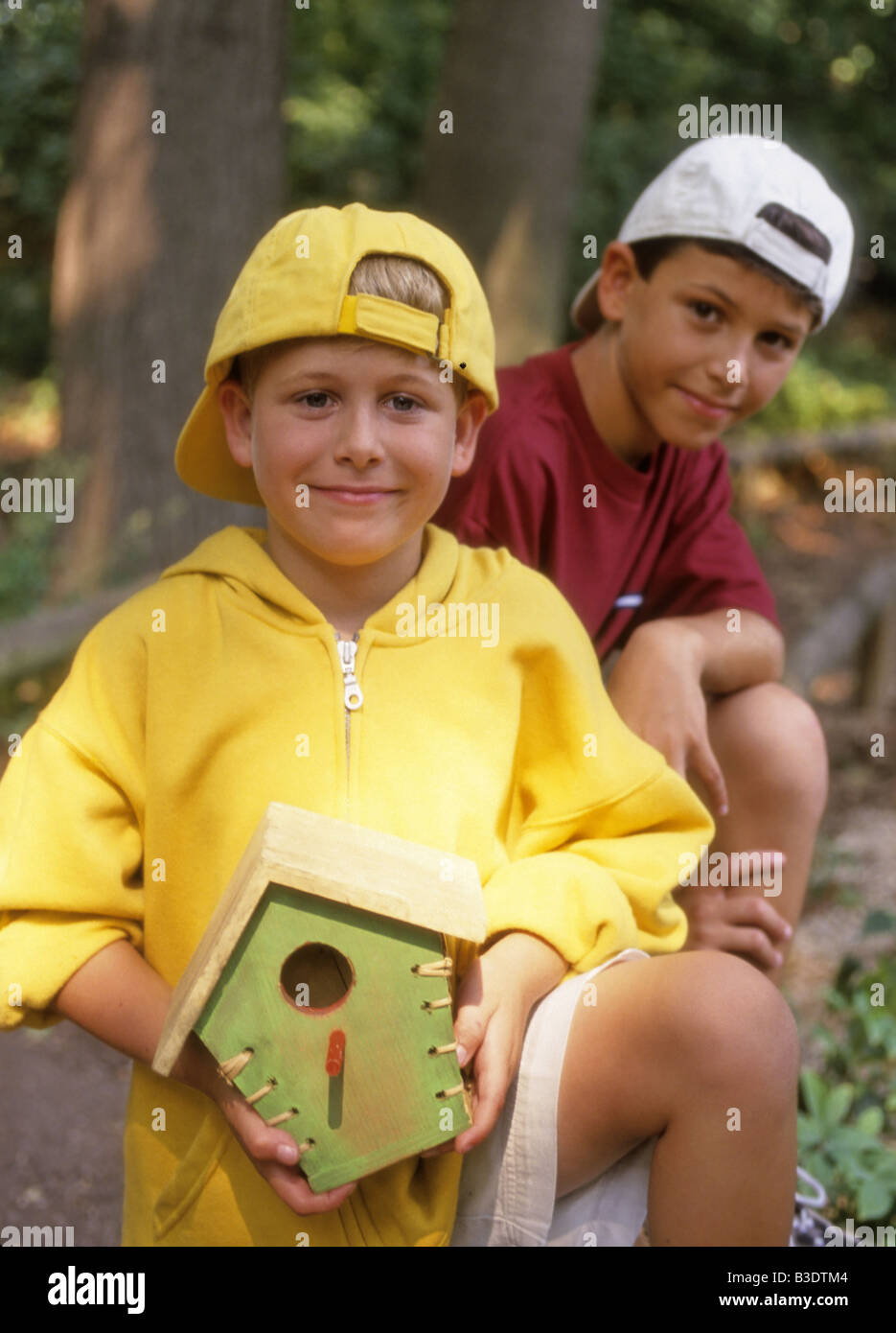 Friend with birdhouse Stock Photo - Alamy