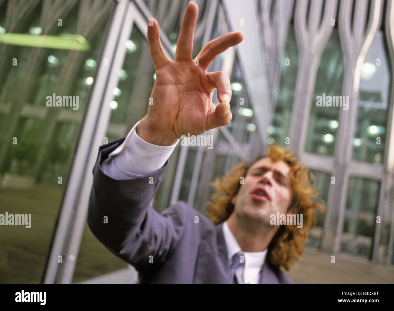 Businessman OK sign Stock Photo - Alamy