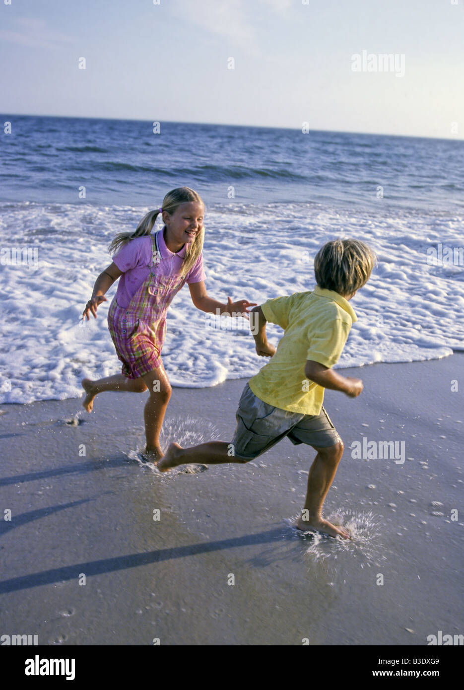 Girl running water attraction hi-res stock photography and images - Alamy