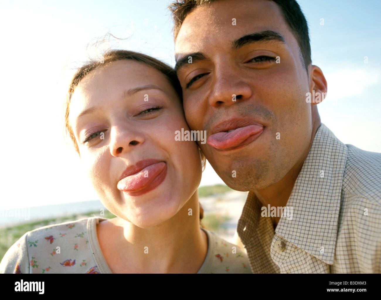 Young couple makes faces Stock Photo - Alamy