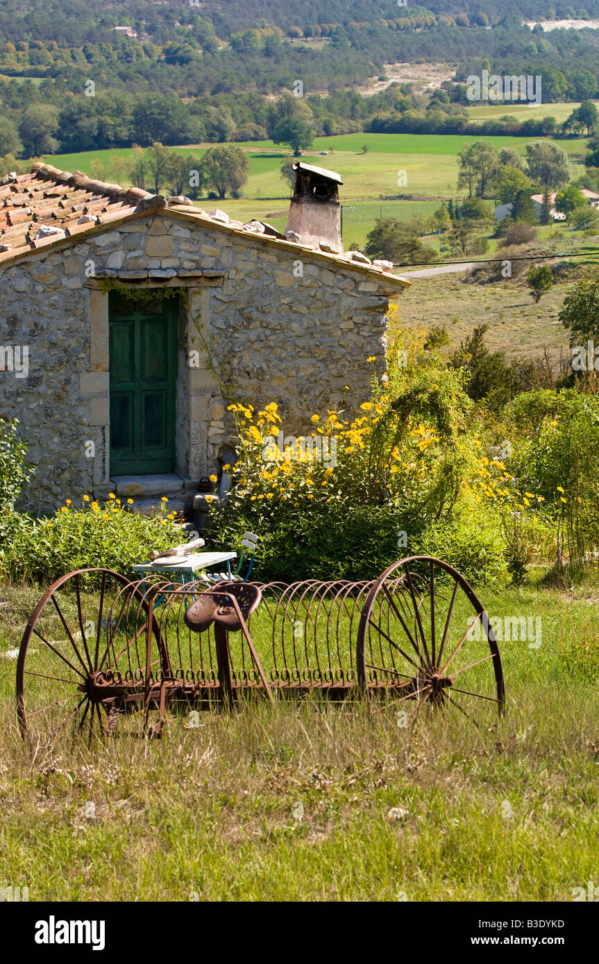 Europe France Provence Trigance rural house and rusty farming tools ...