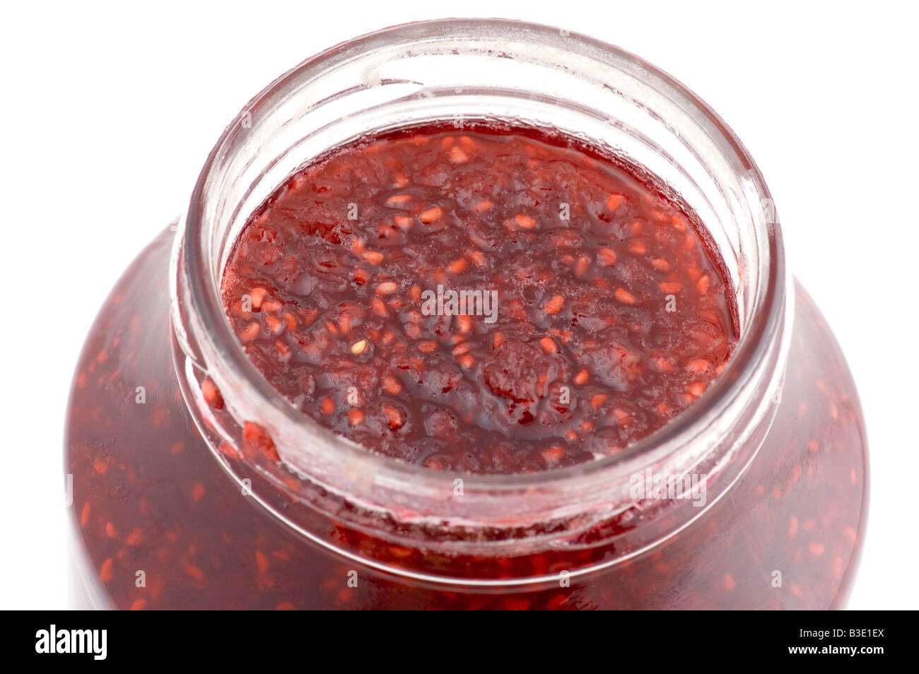 object on white raspberries jam glass jar Stock Photo - Alamy
