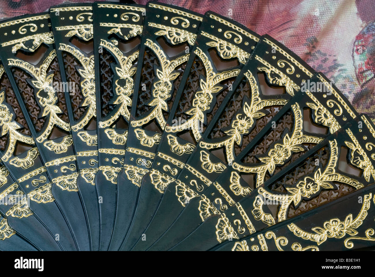 Black plastic fan blades on an old patterned fan Stock Photo - Alamy