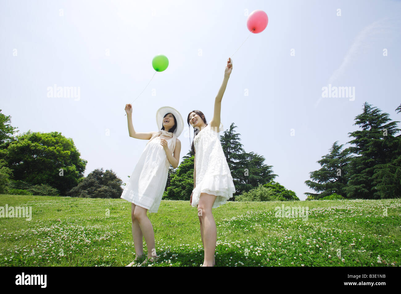 Two ladies with balloons hi-res stock photography and images - Alamy